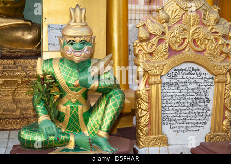 Burmese sightseeing:green Buddhist demon guardian statue, Kyauk Taw Gyi ...