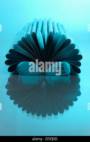 Open magazine with curled pages. Close-up Stock Photo - Alamy