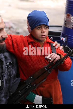 The Arab soldier with the AK-47 Kalashnikov assault rifle Stock Photo ...
