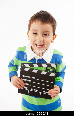 vertical shot of Movie clapper board and popcorn on table top view ...