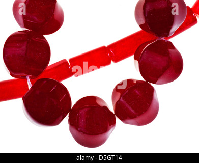 strings of red jade beads isolated on white background Stock Photo - Alamy