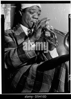 A portrait of jazz legend Louis Armstrong, captured between 1938 and ...