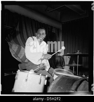 A portrait of Cozy Cole, a prominent jazz drummer, taken between 1938 ...