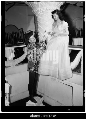 A portrait of Larry Clinton and Betty George at a performance at ...