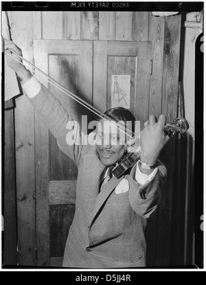 A portrait of Ray Nance, captured in November 1946 at the Aquarium in ...