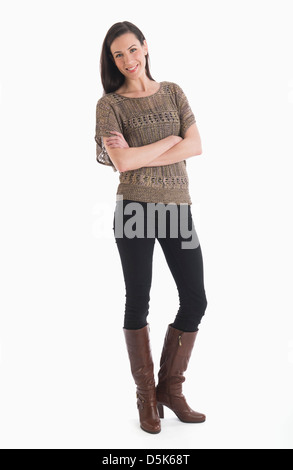 Portrait of female individual with arms crossed feeling sad and ...