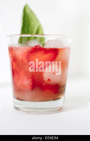 A refreshing strawberry, basil cocktail with a basil garnish Stock Photo - Alamy