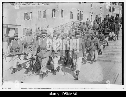 A photograph showing Italian troops leaving their barracks. The image ...