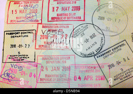 A Visa page in a passport covered in Visa stamps from past trips Stock ...