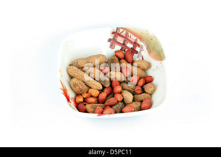 A lot of Peanuts on isolated over white background Stock Photo - Alamy