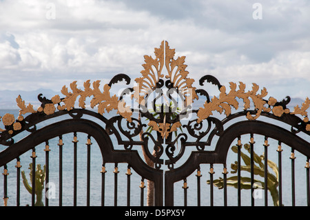 iron gate design with peculiar shapes black and gold color Stock Photo ...