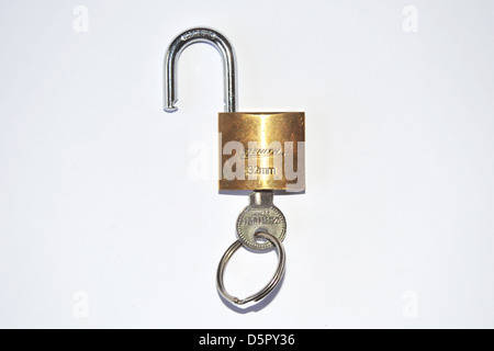 An unlocked Zenith padlock with key photographed in a studio Stock ...