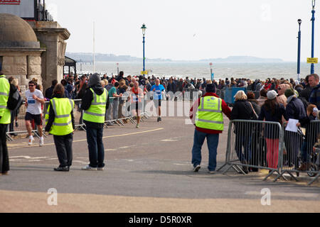 Onlookers at the Bournemouth Bay run, Dorset UK Stock Photo - Alamy