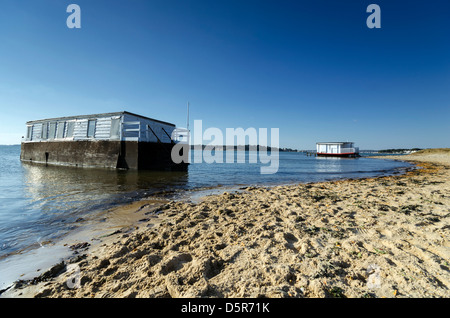 house boat at the Shell Bay, Studland, Shell Bay, Dorset, England, UK ...