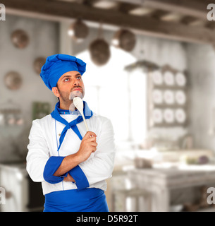 Young chef in the cousine Stock Photo - Alamy