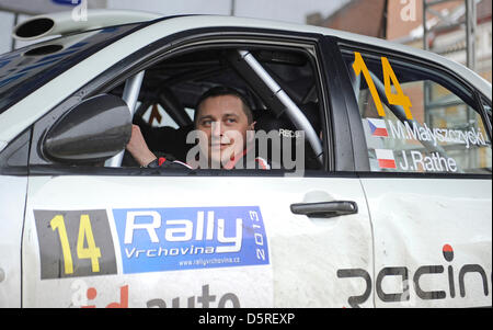 Polish race car driver Mariusz Malyszczycki (left) and his navigator ...