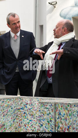 Berlin, Germany, Benjamin Marx in conversation with a Roma family in ...