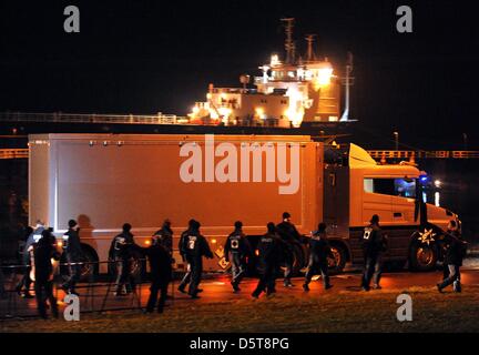 The first of two special trucks loaded with MOX fuel assemblies leave ...