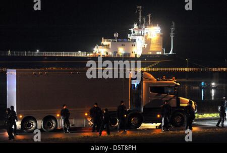 The first of two special trucks loaded with MOX fuel assemblies leave ...