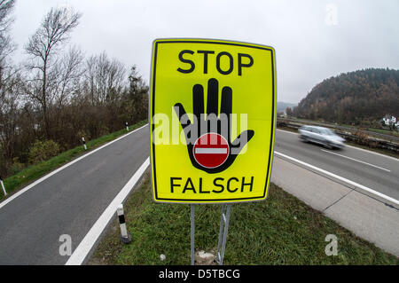 A sign which reads 'STOP FALSCH' ('Stop wrong way') is seen on the A3 ...