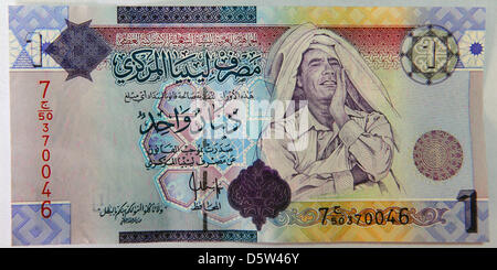 The portrait of the old dictator Gaddafi adorns a few banknotes like ...