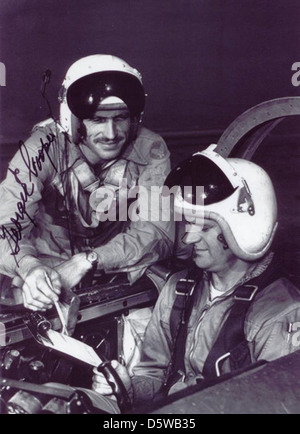 NASA test pilot George E. Cooper is pictured with a Republic F-84F ...
