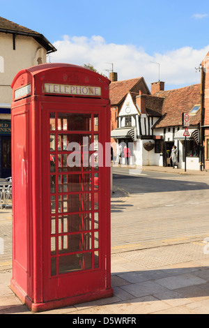 Traditional red telephone kiosks on the streets of London, England, UK ...