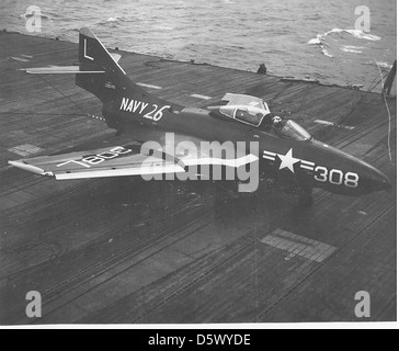 A Grumman F9F-8 on the flight deck of the USS Intrepid aircraft carrier ...