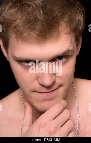 Thinking man, mischievous look Stock Photo - Alamy