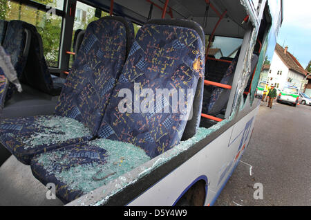 A school bus with destroyed windows is visible in Marktoberdorf ...