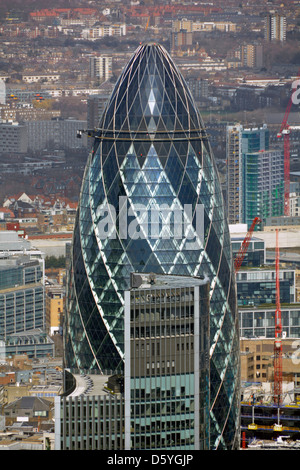 Aerial close up view of The Gherkin and the Willis Buildings which ...