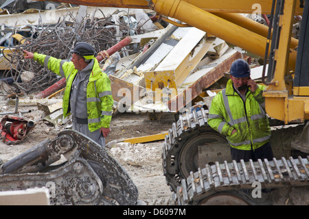 workers carrying out final stages of the demolition of the Imax complex ...