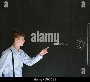 Businessman throwing dart in business concept Stock Photo - Alamy