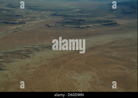 Aerial view, towards Oljato Mesa, dry braided stream channel crossing ...