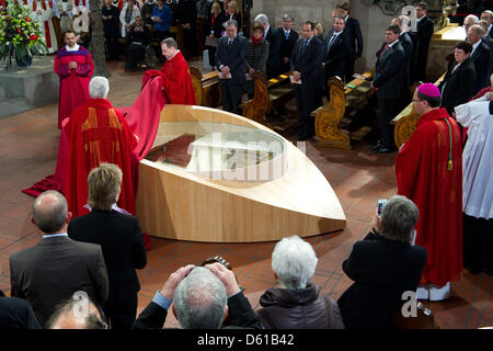 The Holy Robe is unveiled during a mass at the cathedral in Trier ...