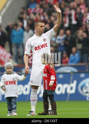 Cologne's Lukas Podolski poses with his children during his farewell ...