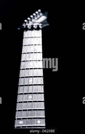 guitar head strings macro on black Stock Photo - Alamy