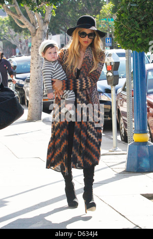 Rachel Zoe carries her son Skyler in her arms while out and about in ...