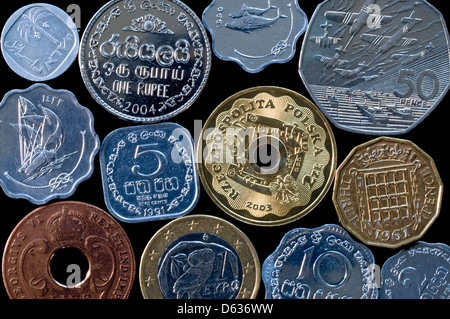 International Coins of different shapes and sizes Stock Photo - Alamy