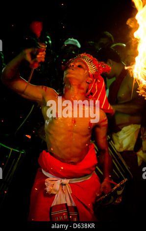 Theyyam is a famous ritual art form in kerala with face painted using ...