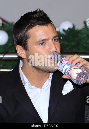 Mark Wright signs his calendar at Selfridges London, England - 15.12.11 ...