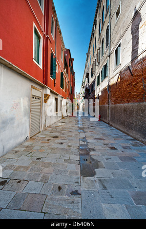Old destroyed door to the Venice home, Italy Stock Photo - Alamy