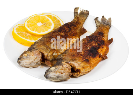 Fried river fish on the plate Stock Photo - Alamy