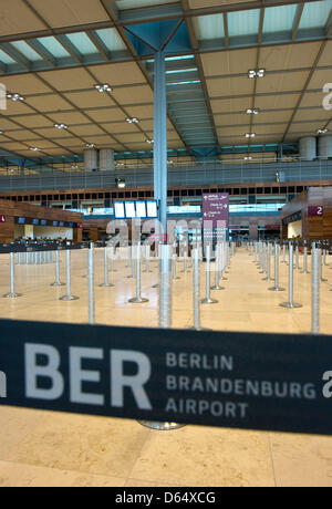 Check-in counters are pictured at the terminal of the new Berlin ...