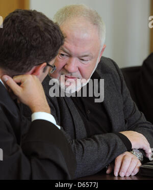 A court bailiff shows hotelier Axel Hilpert his place in a courtroom in ...