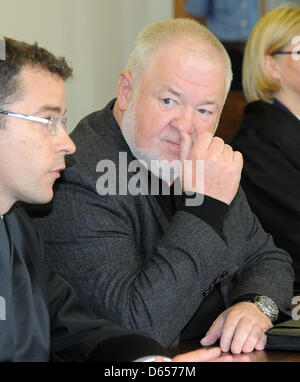 A court bailiff shows hotelier Axel Hilpert his place in a courtroom in ...