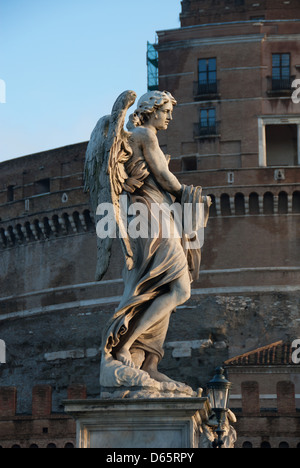 Sculpted stone statue of an angel on the exterior west wall at the ...
