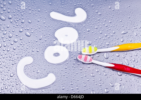 cool and clean concept with colorful toothbrushes Stock Photo - Alamy