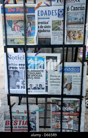 Spanish language Mexican newspapers at a news stand in downtown, Cancun ...