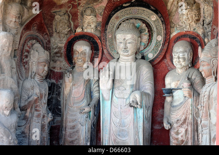Ancient Buddha statue in caves in Guangyuan, Sichuan, China Stock Photo ...